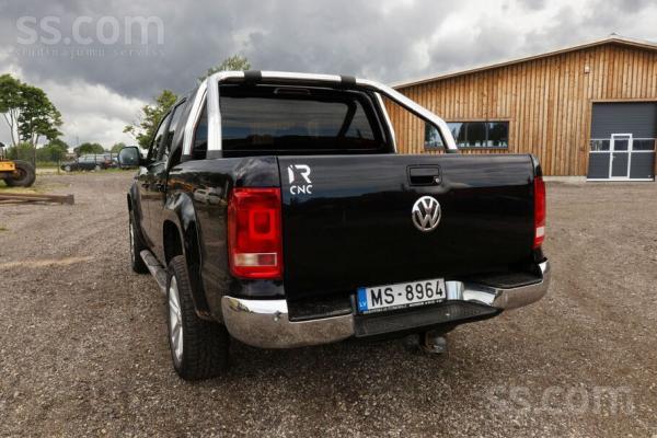 Black Volkswagen Amarok 2013 in Cesis, with an engine capacity of 2.00 L and mileage of 402 thousand km for 12000 €, photo 6 on AUTOMOTO.COM.LV