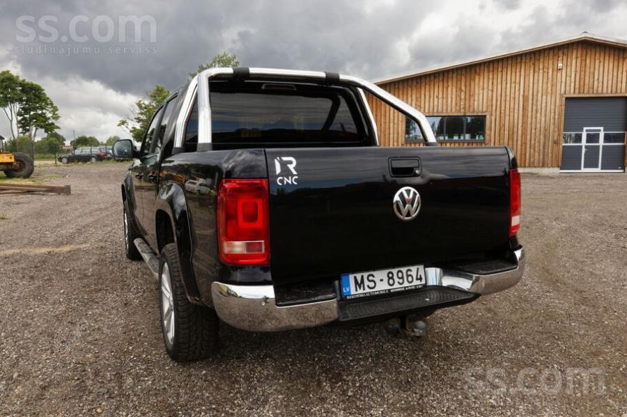 Black Volkswagen Amarok 2013 in Cesis, with an engine capacity of 2.00 L and mileage of 402 thousand km for 12000 €, photo 7 on AUTOMOTO.COM.LV