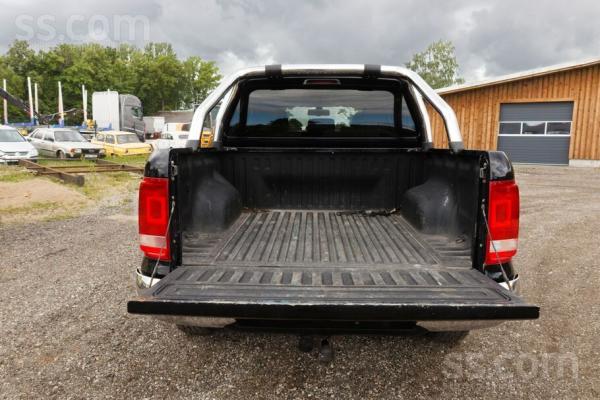 Black Volkswagen Amarok 2013 in Cesis, with an engine capacity of 2.00 L and mileage of 402 thousand km for 12000 €, photo 7 on AUTOMOTO.COM.LV