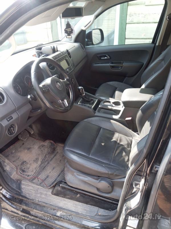 Black Volkswagen Amarok 2013 in Tallinn, with an engine capacity of 2.00 L and mileage of 0 thousand km for 9990 €, photo 4 on AUTOMOTO.COM.LV