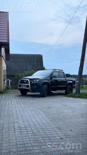 Black Volkswagen Amarok 2014 in Ventspils, with an engine capacity of 2.00 L and mileage of 372 thousand km for 14000 €, photo  on AUTOMOTO.COM.LV