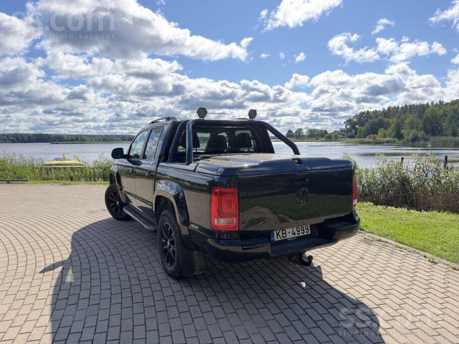 Black Volkswagen Amarok 2014 in Riga, with an engine capacity of 2.00 L and mileage of 362 thousand km for 13500 €, photo 4 on AUTOMOTO.COM.LV