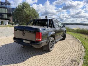 Black Volkswagen Amarok 2014 in Riga, with an engine capacity of 2.00 L and mileage of 362 thousand km for 13500 €, photo 5 on AUTOMOTO.COM.LV