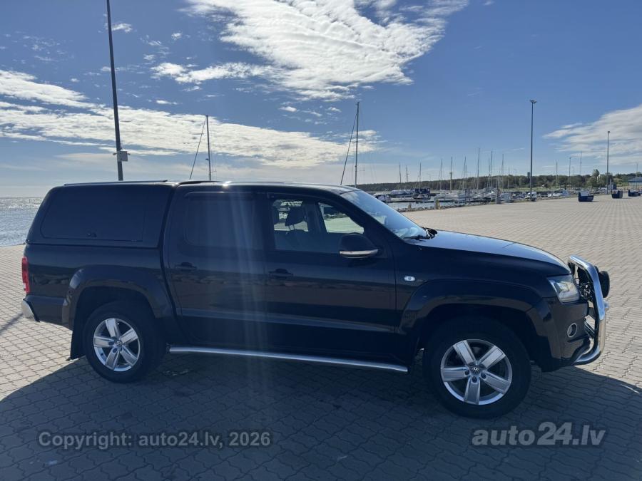 Black Volkswagen Amarok 2015 in Tallinn, with an engine capacity of 2.00 L and mileage of 314 thousand km for 14500 €, photo 4 on AUTOMOTO.COM.LV