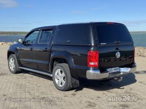 Black Volkswagen Amarok 2015 in Tallinn, with an engine capacity of 2.00 L and mileage of 314 thousand km for 14500 €, photo 6 on AUTOMOTO.COM.LV