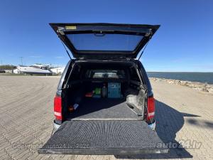 Black Volkswagen Amarok 2015 in Tallinn, with an engine capacity of 2.00 L and mileage of 314 thousand km for 14500 €, photo 7 on AUTOMOTO.COM.LV