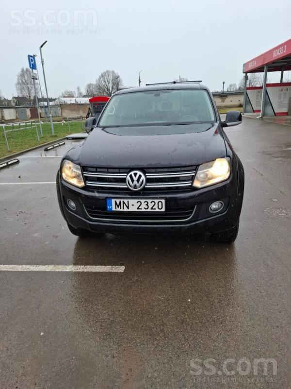 Black Volkswagen Amarok 2015 in Bauska, with an engine capacity of 2.00 L and mileage of 248 thousand km for 10300 €, photo 1 on AUTOMOTO.COM.LV