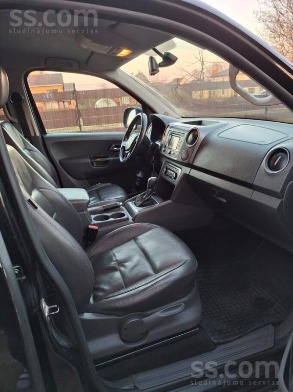 Black Volkswagen Amarok 2015 in Bauska, with an engine capacity of 2.00 L and mileage of 248 thousand km for 10300 €, photo 4 on AUTOMOTO.COM.LV