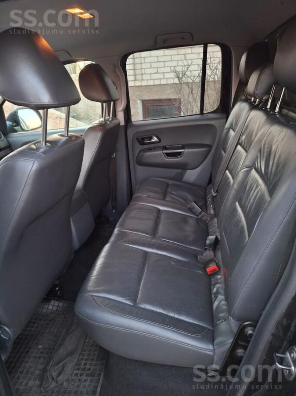 Black Volkswagen Amarok 2015 in Bauska, with an engine capacity of 2.00 L and mileage of 248 thousand km for 10300 €, photo 5 on AUTOMOTO.COM.LV