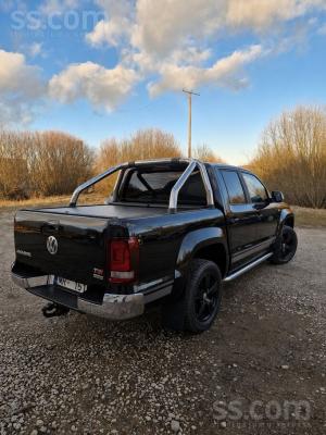Black Volkswagen Amarok 2015 in Kuldiga, with an engine capacity of 2.00 L and mileage of 256 thousand km for 16800 €, photo 3 on AUTOMOTO.COM.LV
