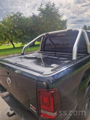 Black Volkswagen Amarok 2015 in Kuldiga, with an engine capacity of 2.00 L and mileage of 256 thousand km for 16800 €, photo 4 on AUTOMOTO.COM.LV