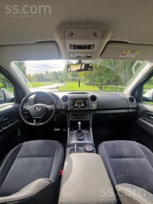 Black Volkswagen Amarok 2015 in Kuldiga, with an engine capacity of 2.00 L and mileage of 256 thousand km for 16800 €, photo 7 on AUTOMOTO.COM.LV