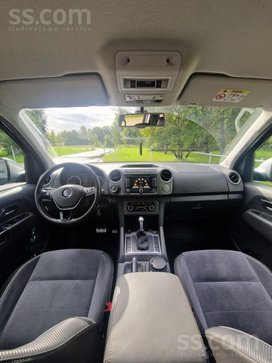 Black Volkswagen Amarok 2015 in Kuldiga, with an engine capacity of 2.00 L and mileage of 256 thousand km for 16800 €, photo 7 on AUTOMOTO.COM.LV