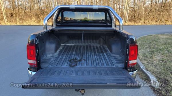 Black Volkswagen Amarok 2016 in Tallinn, with an engine capacity of 3.00 L and mileage of 135 thousand km for 21990 €, photo 7 on AUTOMOTO.COM.LV