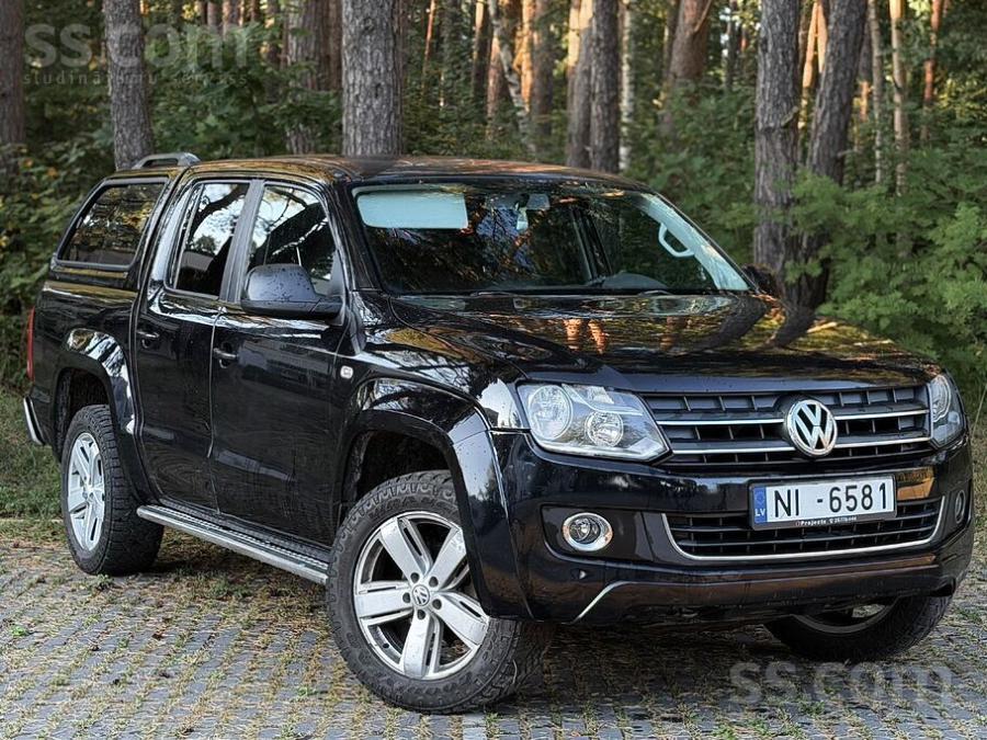 Black Volkswagen Amarok 2011 in Jurmala, with an engine capacity of 2.00 L and mileage of 425 thousand km for 8500 €, photo 1 on AUTOMOTO.COM.LV
