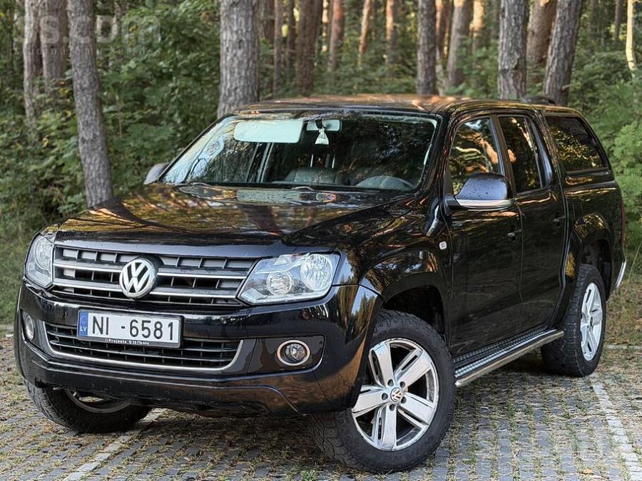 Black Volkswagen Amarok 2011 in Jurmala, with an engine capacity of 2.00 L and mileage of 425 thousand km for 8500 €, photo 3 on AUTOMOTO.COM.LV