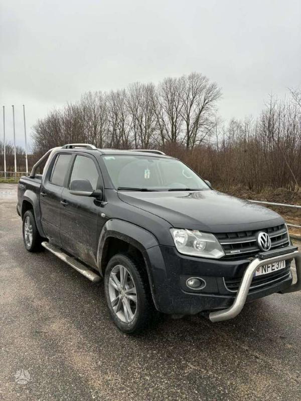 Black Volkswagen Amarok 2012 in Telschi, with an engine capacity of 1.97 L and mileage of 350 thousand km for 11800 €, photo 2 on AUTOMOTO.COM.LV