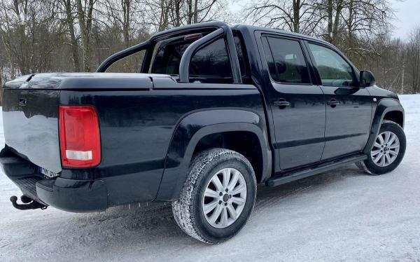 Black Volkswagen Amarok 2012 in Vilnius, with an engine capacity of 1.97 L and mileage of 365 thousand km for 11500 €, photo 5 on AUTOMOTO.COM.LV