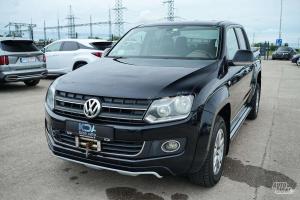 Black Volkswagen Amarok 2012 in Marijampole, with an engine capacity of 2.00 L and mileage of 270 thousand km for 10950 €, photo 5 on AUTOMOTO.COM.LV