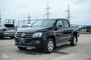 Black Volkswagen Amarok 2012 in Marijampole, with an engine capacity of 2.00 L and mileage of 270 thousand km for 10950 €, photo 6 on AUTOMOTO.COM.LV