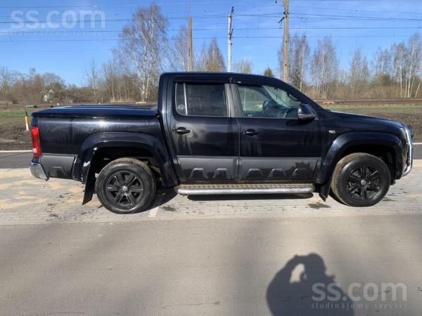Black Volkswagen Amarok 2012 in Riga, with an engine capacity of 2.00 L and mileage of 344 thousand km for 6900 €, photo 8 on AUTOMOTO.COM.LV