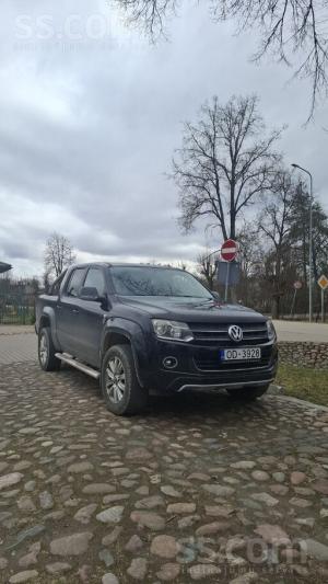 Black Volkswagen Amarok 2012 in Aizkraukle, with an engine capacity of 2.00 L and mileage of 236 thousand km for 11100 €, photo  on AUTOMOTO.COM.LV
