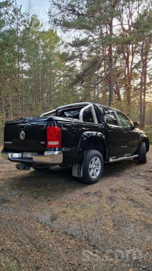 Melns Volkswagen Amarok 2012 Liepāja, ar dzinēja tilpumu 2.00 L un nobraukumu 211 tūkst. km par 10500 €, foto 7 vietnē AUTOMOTO.COM.LV