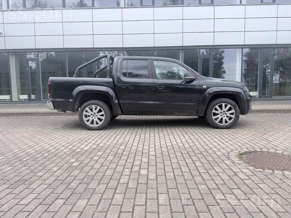 Black Volkswagen Amarok 2012 in Tukums, with an engine capacity of 2.00 L and mileage of 400 thousand km for 7900 €, photo 2 on AUTOMOTO.COM.LV