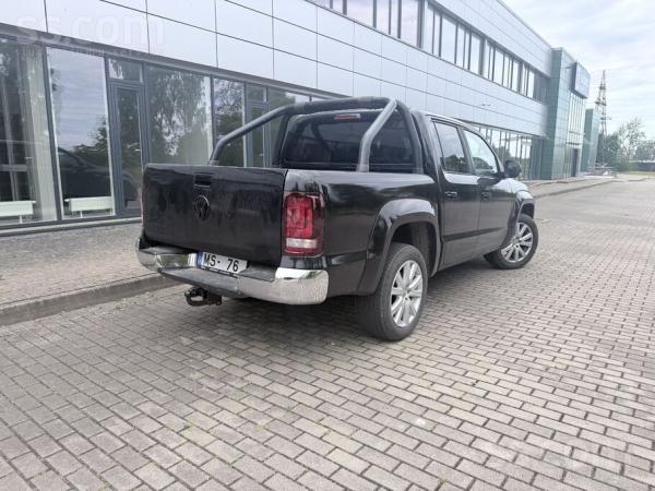 Black Volkswagen Amarok 2012 in Tukums, with an engine capacity of 2.00 L and mileage of 400 thousand km for 7900 €, photo 3 on AUTOMOTO.COM.LV