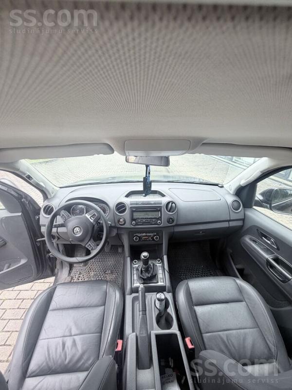 Black Volkswagen Amarok 2012 in Tukums, with an engine capacity of 2.00 L and mileage of 400 thousand km for 7900 €, photo 10 on AUTOMOTO.COM.LV