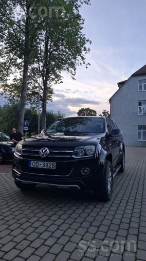 Black Volkswagen Amarok 2012 in Aizkraukle, with an engine capacity of 2.00 L and mileage of 232 thousand km for 10600 €, photo 3 on AUTOMOTO.COM.LV