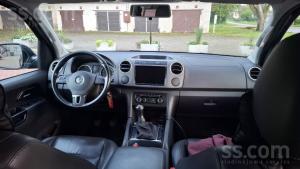 Black Volkswagen Amarok 2012 in Aizkraukle, with an engine capacity of 2.00 L and mileage of 232 thousand km for 10600 €, photo 5 on AUTOMOTO.COM.LV