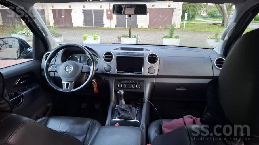 Black Volkswagen Amarok 2012 in Aizkraukle, with an engine capacity of 2.00 L and mileage of 232 thousand km for 10600 €, photo 5 on AUTOMOTO.COM.LV