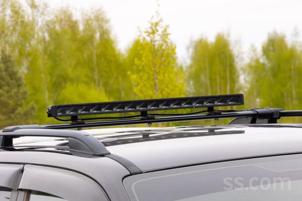 Black Volkswagen Amarok 2013 in Jelgava, with an engine capacity of 2.00 L and mileage of 305 thousand km for 13490 €, photo 6 on AUTOMOTO.COM.LV