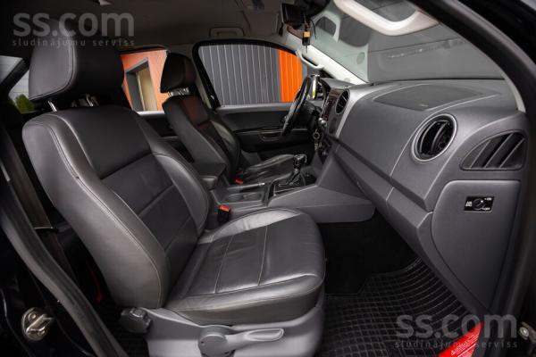 Black Volkswagen Amarok 2013 in Jelgava, with an engine capacity of 2.00 L and mileage of 305 thousand km for 13490 €, photo 9 on AUTOMOTO.COM.LV