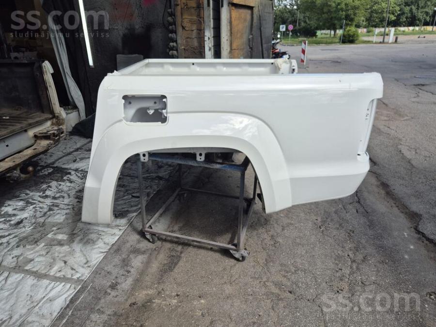 Melns Volkswagen Amarok 2015 Rīga, ar dzinēja tilpumu 2.00 L un nobraukumu 260 tūkst. km par 18500 €, foto 13 vietnē AUTOMOTO.COM.LV
