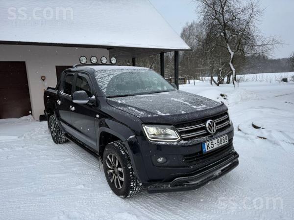 Black Volkswagen Amarok 2016 in Riga, with an engine capacity of 2.00 L and mileage of 279 thousand km for 16900 €, photo 2 on AUTOMOTO.COM.LV