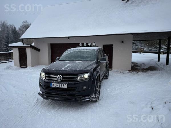 Black Volkswagen Amarok 2016 in Riga, with an engine capacity of 2.00 L and mileage of 279 thousand km for 16900 €, photo 5 on AUTOMOTO.COM.LV