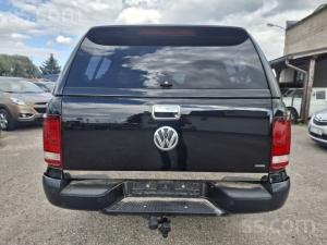 Black Volkswagen Amarok 2016 in Talsi, with an engine capacity of 2.00 L and mileage of 236 thousand km for 16800 €, photo 7 on AUTOMOTO.COM.LV