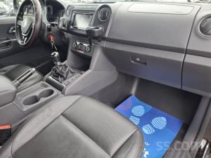 Black Volkswagen Amarok 2016 in Talsi, with an engine capacity of 2.00 L and mileage of 236 thousand km for 16800 €, photo 14 on AUTOMOTO.COM.LV