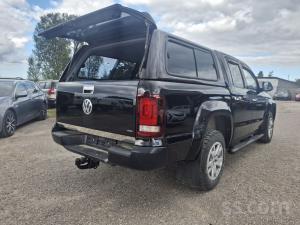 Black Volkswagen Amarok 2016 in Talsi, with an engine capacity of 2.00 L and mileage of 236 thousand km for 16800 €, photo 28 on AUTOMOTO.COM.LV