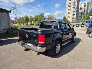 Melns Volkswagen Amarok 2016 Rīga, ar dzinēja tilpumu 2.00 L un nobraukumu 263 tūkst. km par 14990 €, foto 7 vietnē AUTOMOTO.COM.LV
