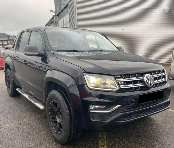 Black Volkswagen Amarok 2017 in Marijampole, with an engine capacity of 2.97 L and mileage of 354 thousand km for 15900 €, photo 1 on AUTOMOTO.COM.LV