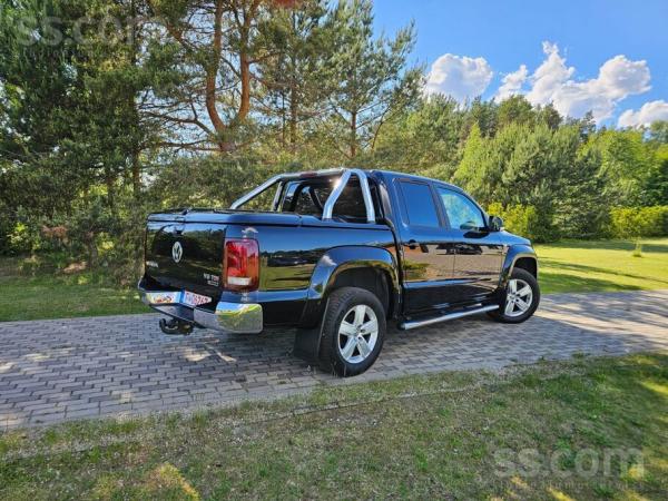 Black Volkswagen Amarok 2018 in Riga, with an engine capacity of 3.00 L and mileage of 240 thousand km for 20777 €, photo 8 on AUTOMOTO.COM.LV