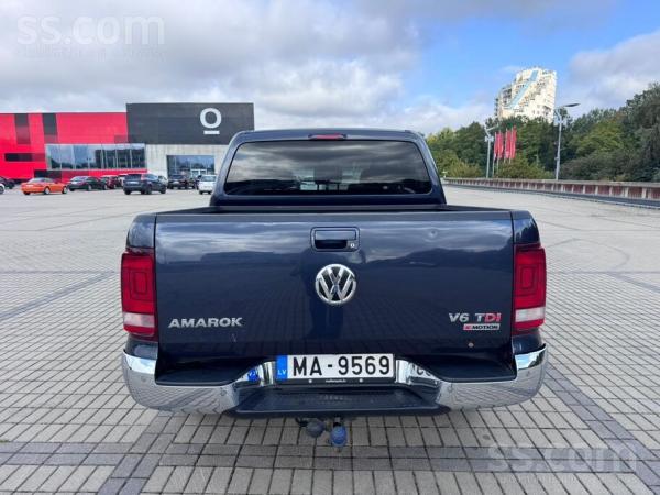 Black Volkswagen Amarok 2019 in Riga, with an engine capacity of 3.00 L and mileage of 151 thousand km for 19900 €, photo 7 on AUTOMOTO.COM.LV