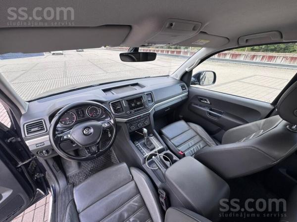 Black Volkswagen Amarok 2019 in Riga, with an engine capacity of 3.00 L and mileage of 151 thousand km for 19900 €, photo 11 on AUTOMOTO.COM.LV