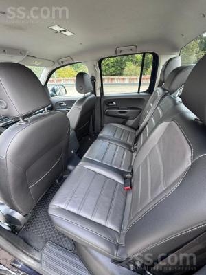 Black Volkswagen Amarok 2019 in Riga, with an engine capacity of 3.00 L and mileage of 151 thousand km for 19900 €, photo 12 on AUTOMOTO.COM.LV