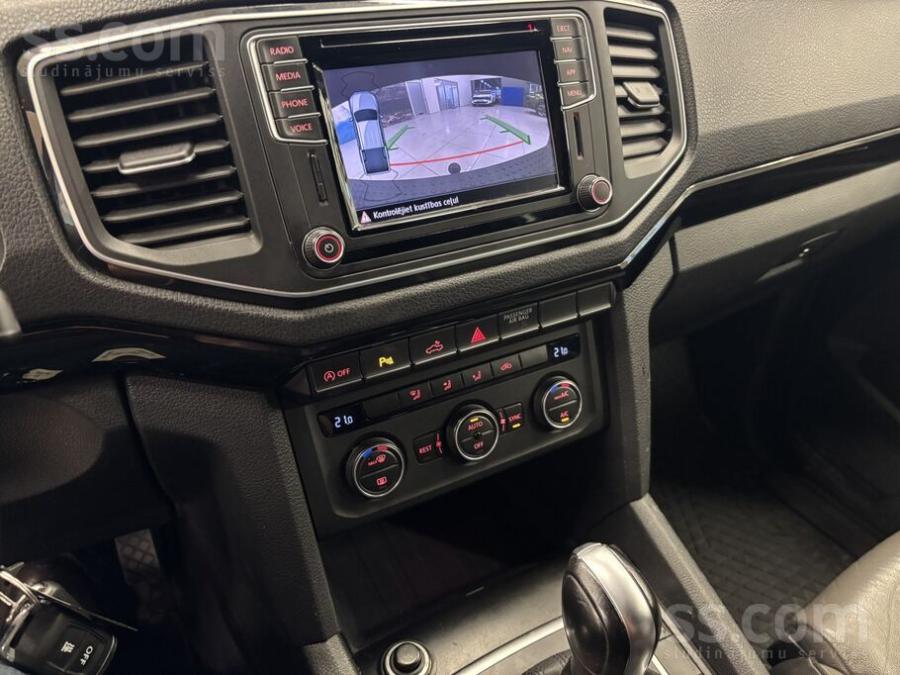 Black Volkswagen Amarok 2020 in Riga, with an engine capacity of 3.00 L and mileage of 58 thousand km for 24900 €, photo 19 on AUTOMOTO.COM.LV