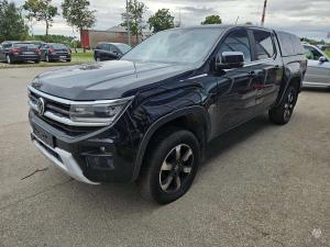 Black Volkswagen Amarok 2023 in Siauliai, with an engine capacity of 3.00 L and mileage of 270 thousand km for 22900 €, photo  on AUTOMOTO.COM.LV