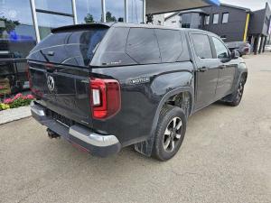 Black Volkswagen Amarok 2023 in Siauliai, with an engine capacity of 3.00 L and mileage of 270 thousand km for 22900 €, photo 4 on AUTOMOTO.COM.LV